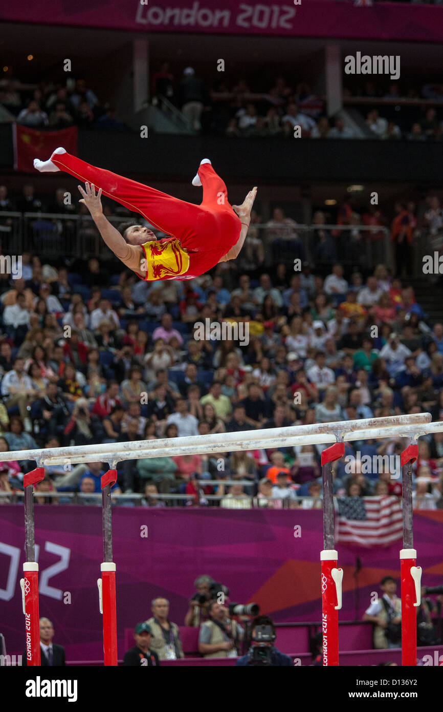 Zhang Chenglong (CHN) competing on the parallel bars during the men's ...