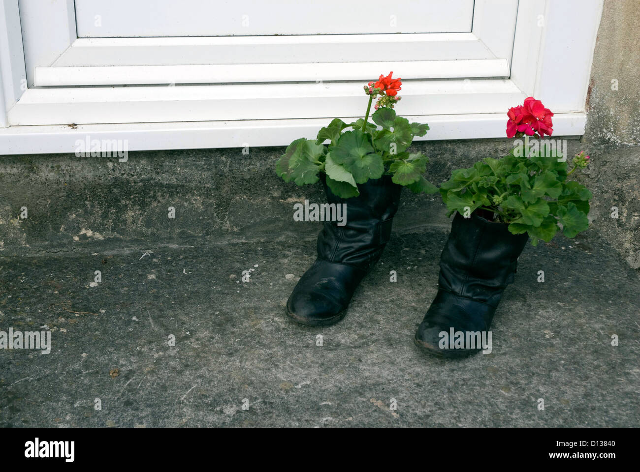 Old black boots hi-res stock photography and images - Alamy