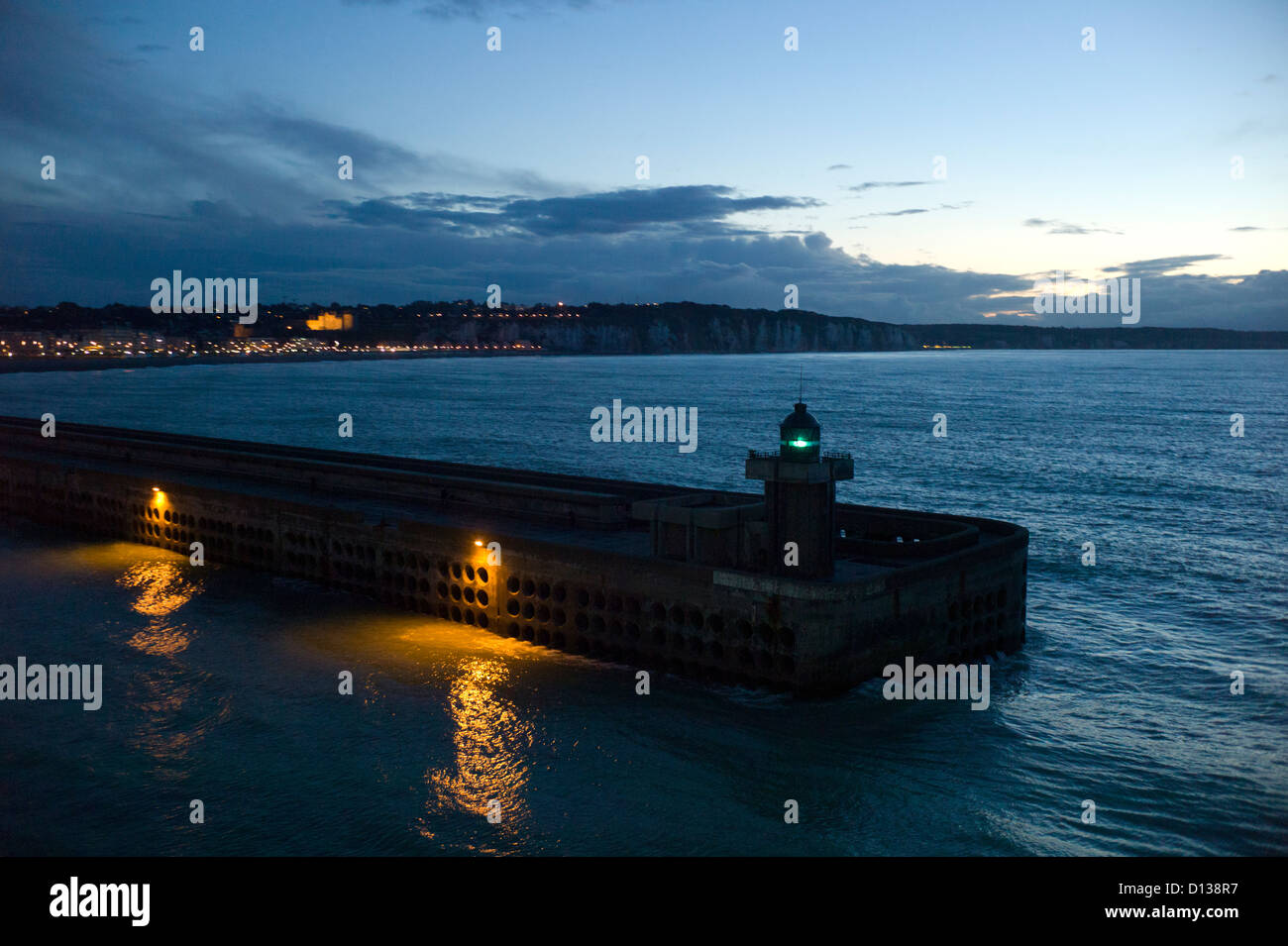 harbour wall and lighthouse at dusk, Dieppe, France Stock Photo - Alamy
