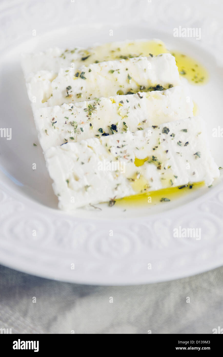 Sliced Feta Cheese Appetizer Sprinkled With Dried Oregano And Extra ...