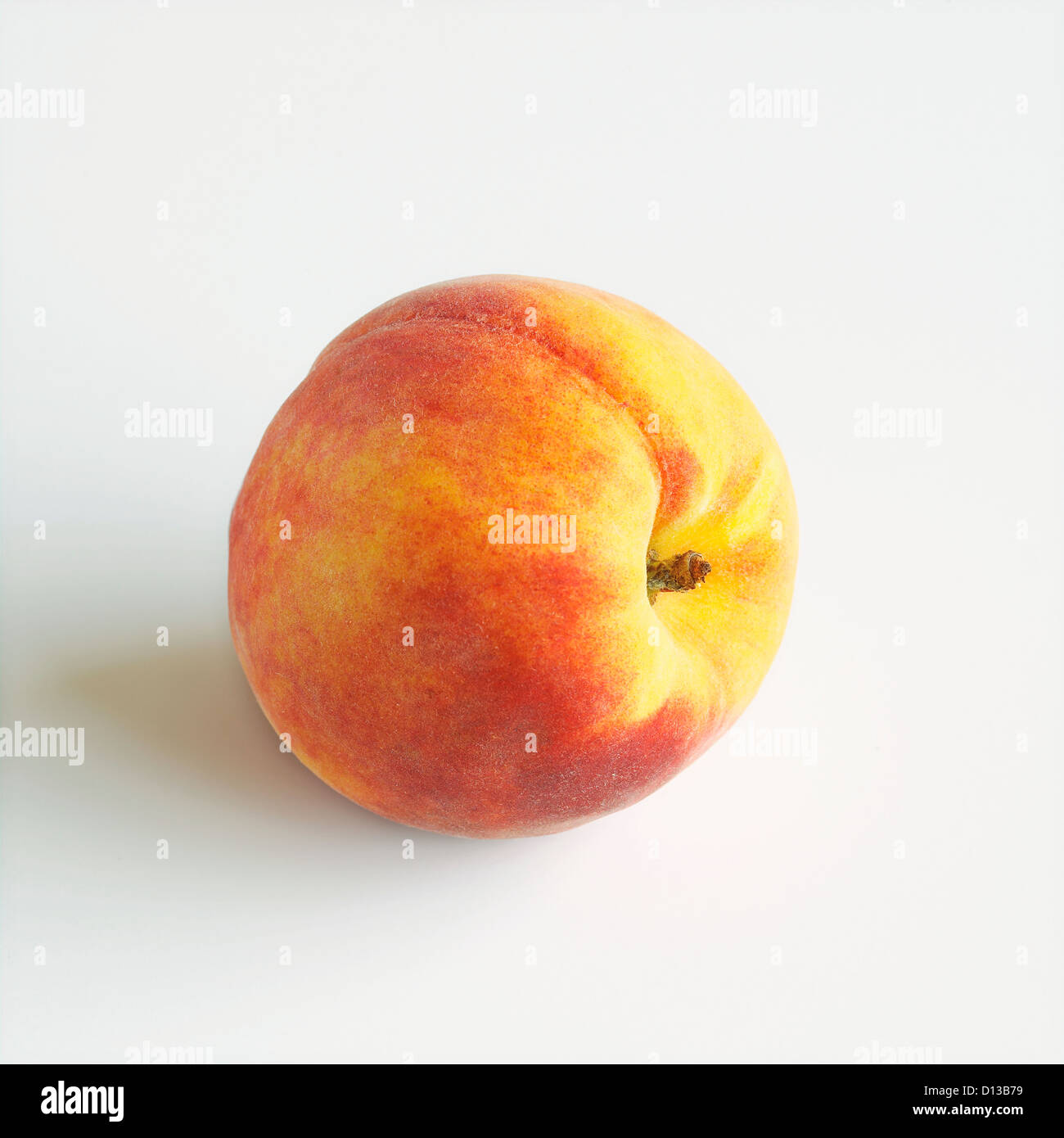 Close-Up Of Ripe Peach On White Background Stock Photo - Alamy