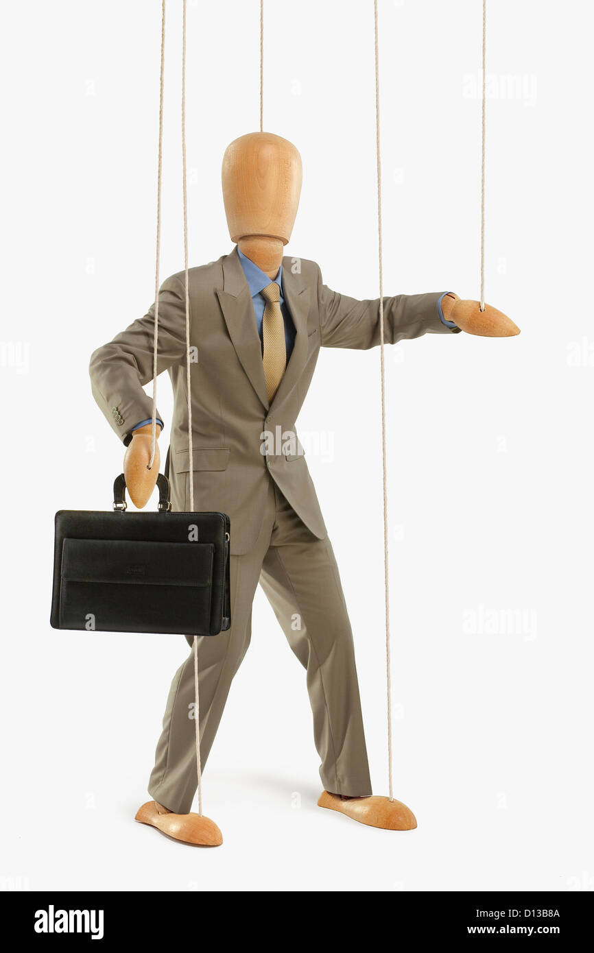 Puppet Dressed As A Businessman Stock Photo - Alamy