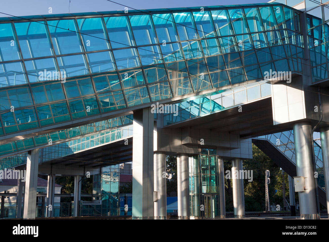 Pedestrian crossing at modern railroad station Stock Photo - Alamy