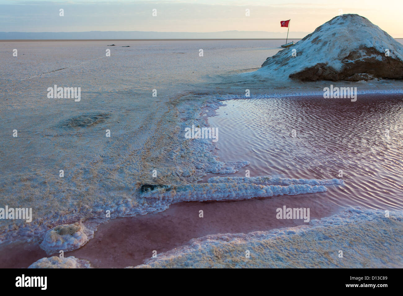 Salt lake Chott el Jerid in central Tunisia, Africa. Tunisian flag and ...