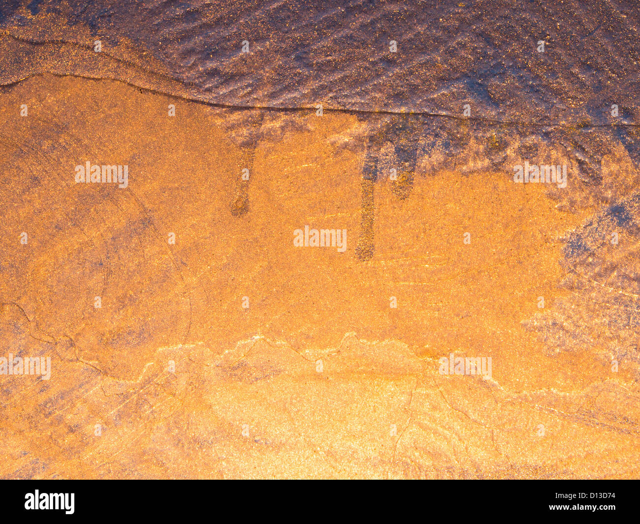 Sunset light seen through a sheet of ice Stock Photo - Alamy