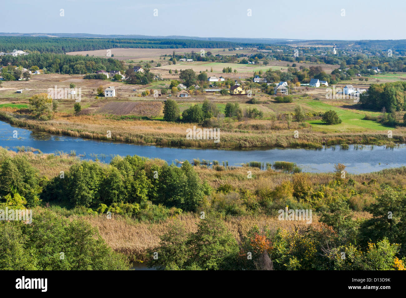 Rural landscape with river, village and trees Stock Photo - Alamy