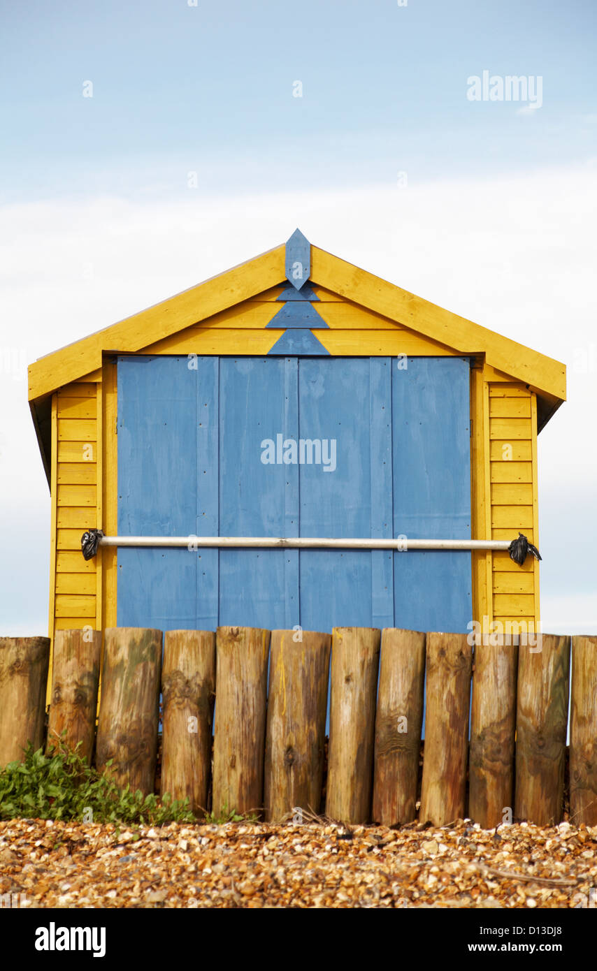 Yellow and blue beach hut at Calshot, Hampshire in November Stock Photo ...