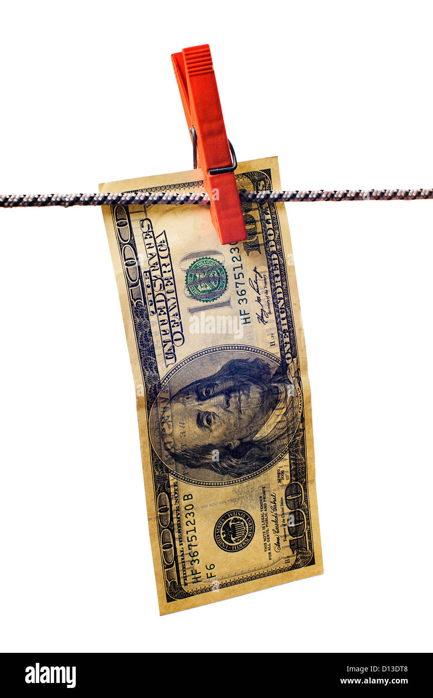 drying dollar with clothespin on cord on white background Stock Photo ...