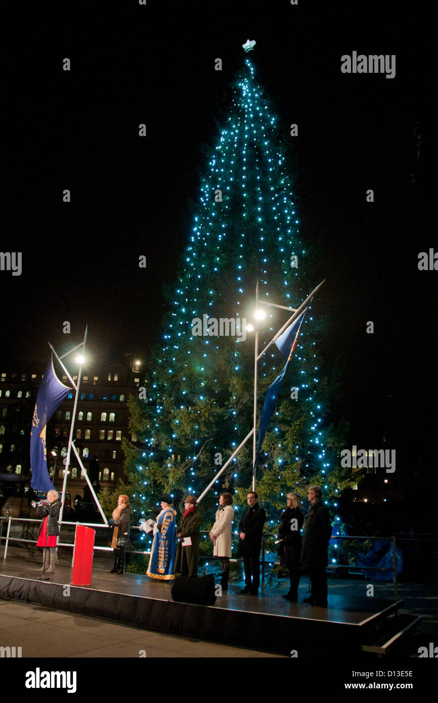 London, UK. 06/12/12. The tree is lit during Lighting-up Ceremony of ...
