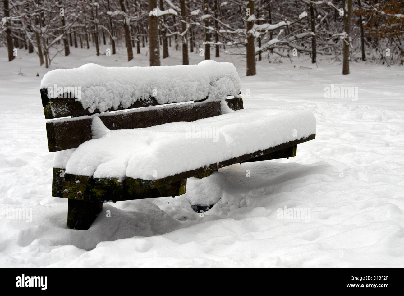 winter with snow on bench Stock Photo - Alamy