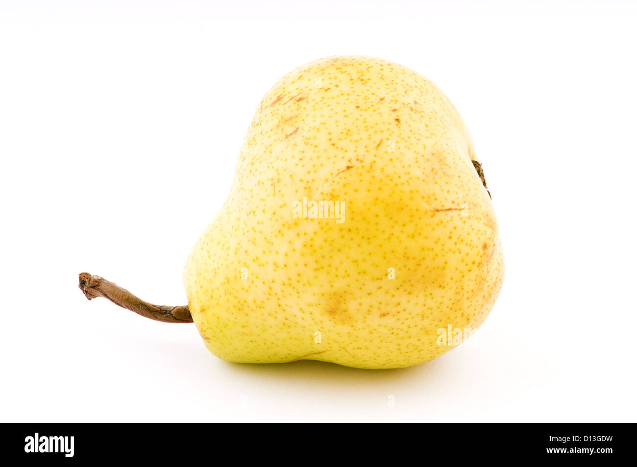 yellow pear close-up isolated on white background Stock Photo - Alamy