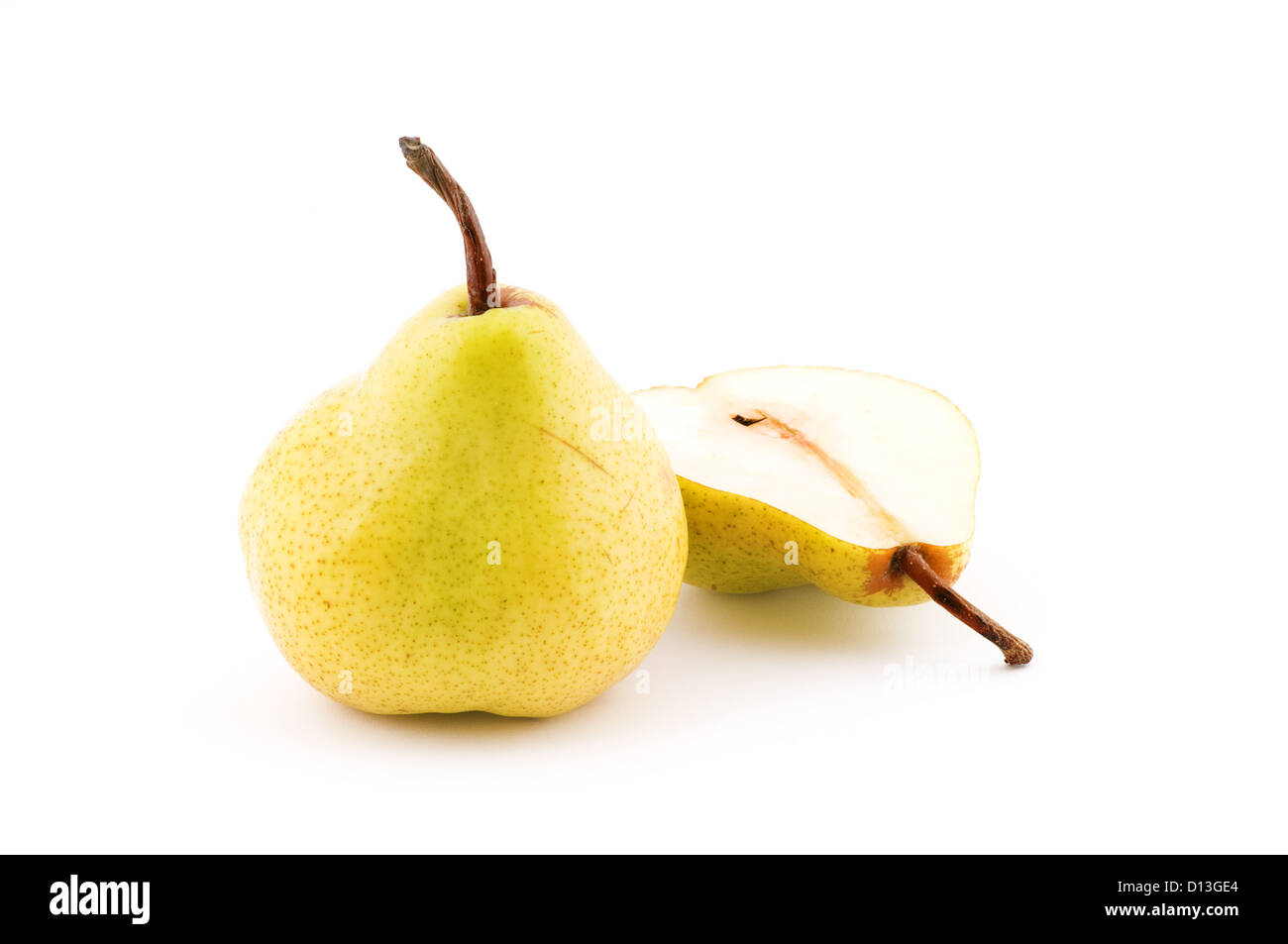 yellow pear close-up isolated on white background Stock Photo - Alamy