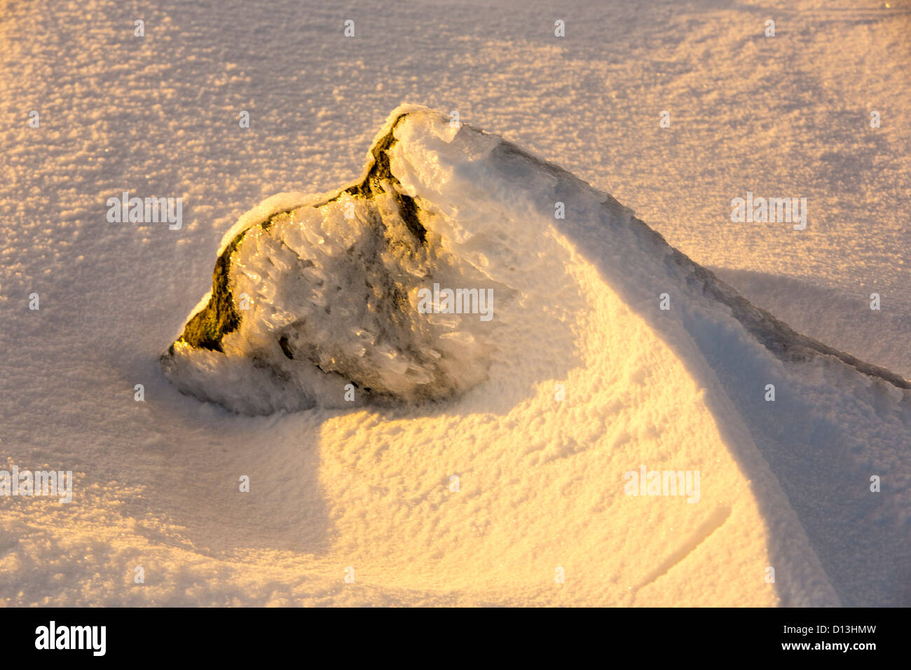 Hoare frost on rocks on the summit plateau of Helvellyn at sunset, Lake ...