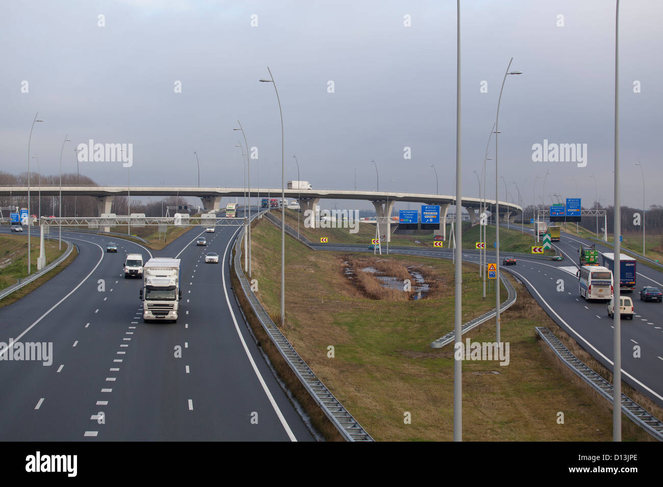 Traffic at highway A67 passing Eindhoven in the Netherlands Stock Photo ...