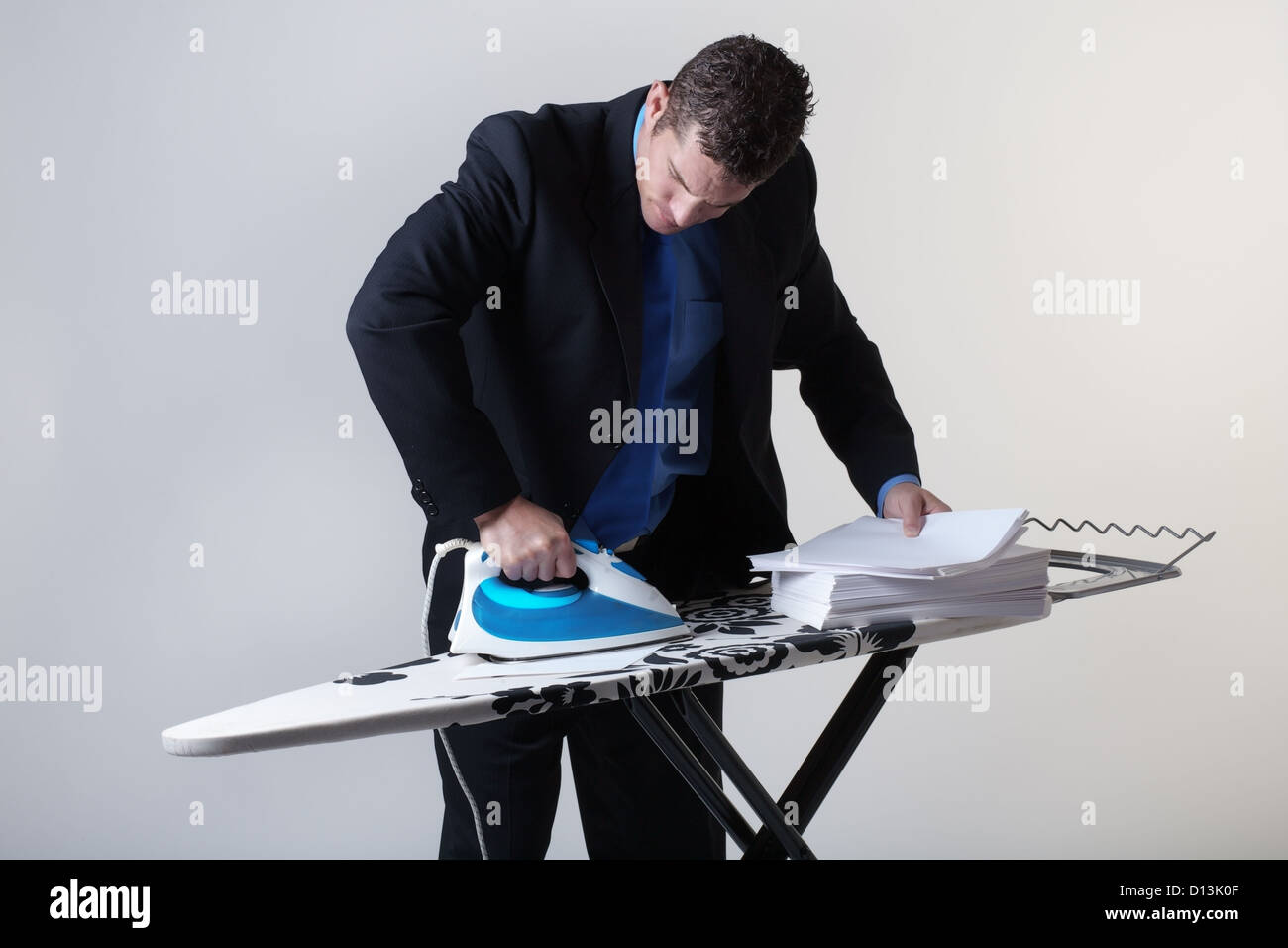 business man ironing out paperwork, keeping good documentations Stock ...