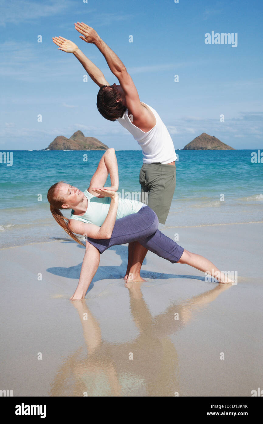 Hawaii, Oahu, Lanikai, Young Couple Do Yoga On Beach Stock Photo - Alamy