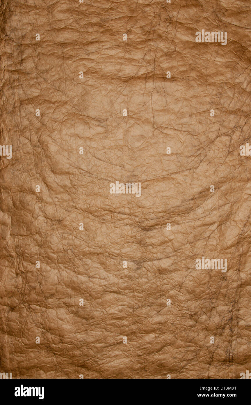 Old brown crumpled paper hi-res stock photography and images - Alamy