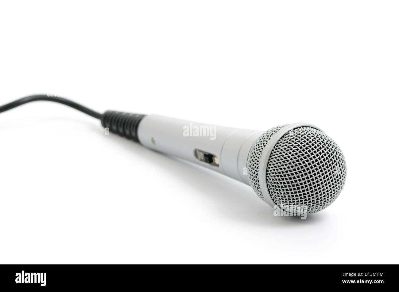 silver color microphone on white background Stock Photo - Alamy