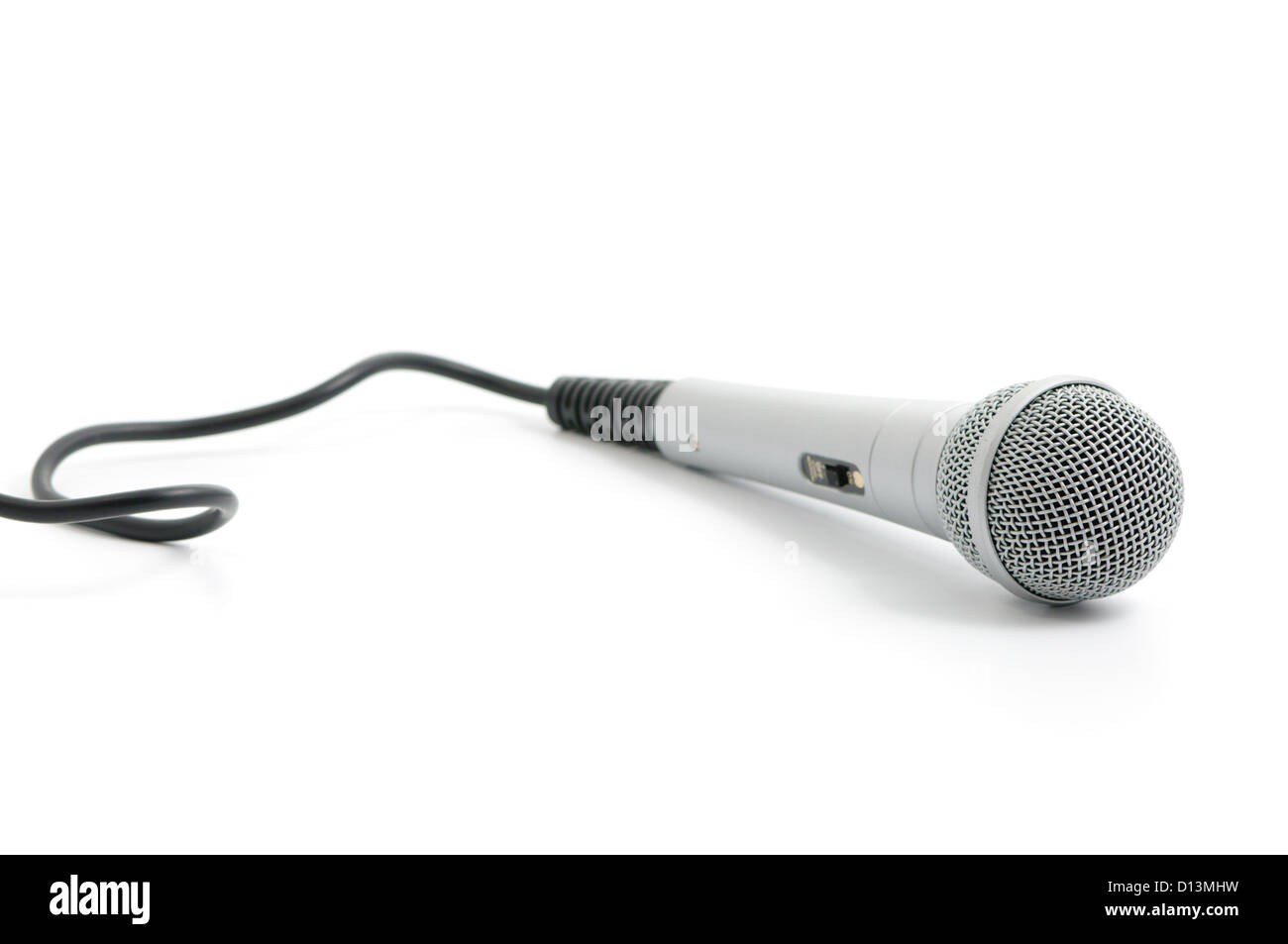silver color microphone on white background Stock Photo - Alamy