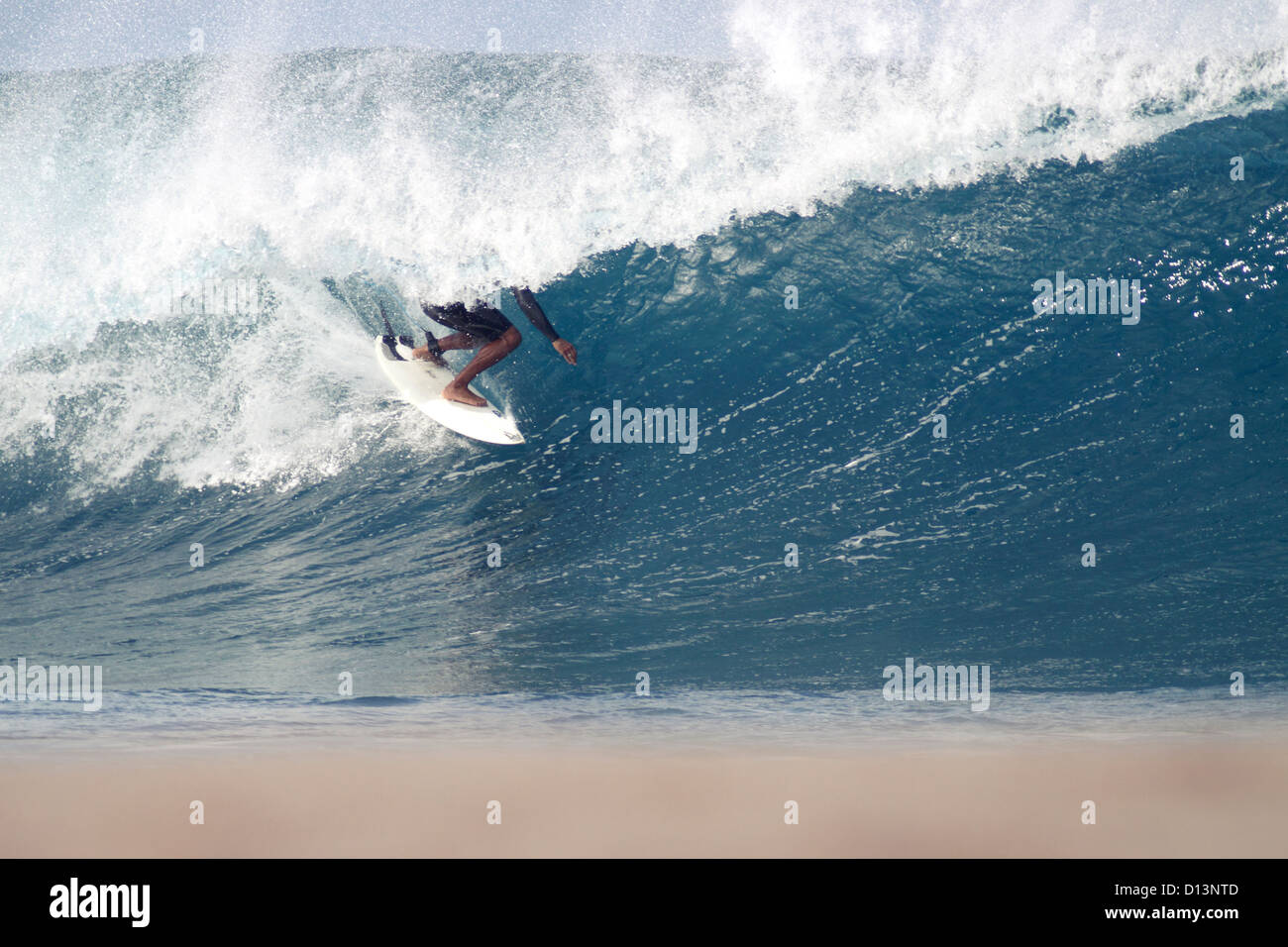 Hawaii, Oahu, Surfer Catching A Wave Near Shore Stock Photo - Alamy