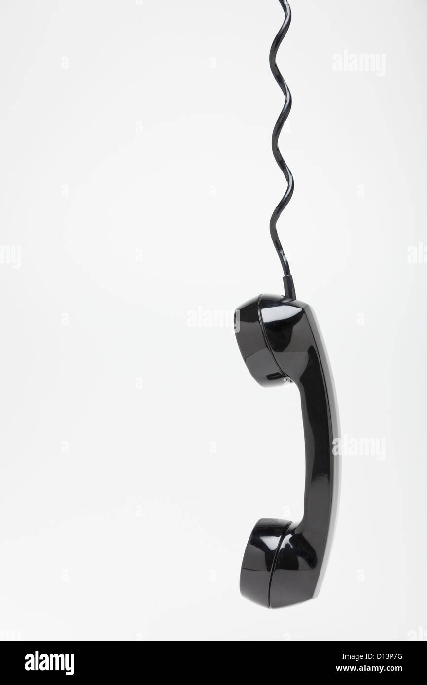 Old telephone receiver hanging hi-res stock photography and images - Alamy