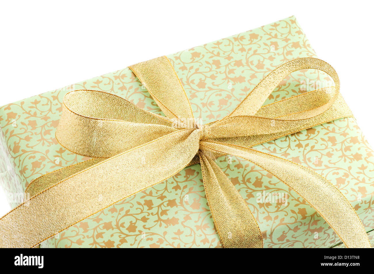 green gift box with gold ribbon Stock Photo - Alamy