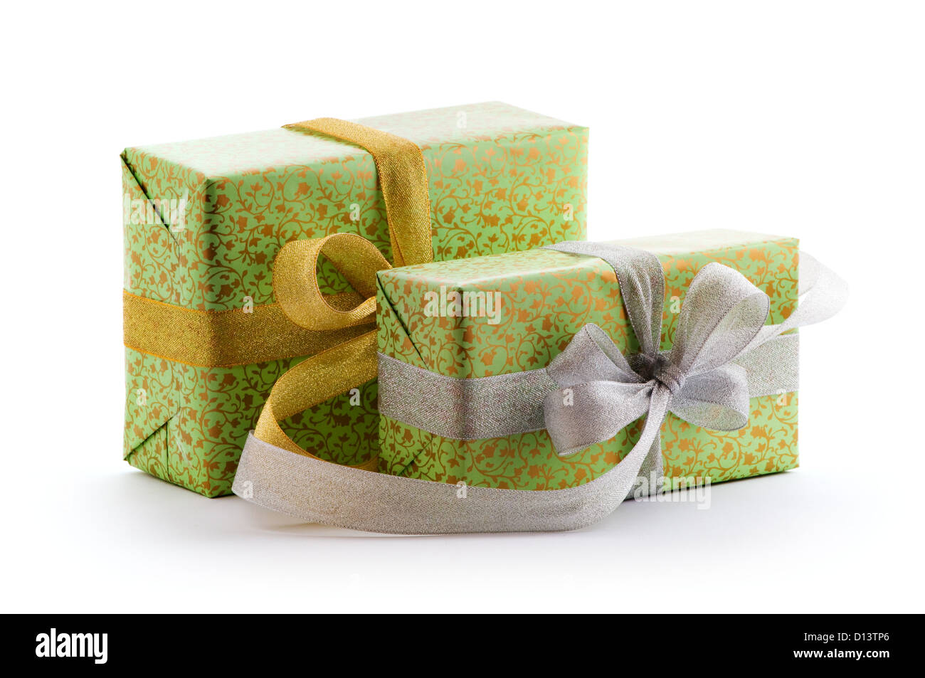 green gift boxes with gold and silver ribbon Stock Photo - Alamy