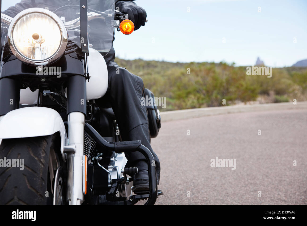 USA, Arizona, Phoenix, Biker on motorcycle in desert area Stock Photo ...