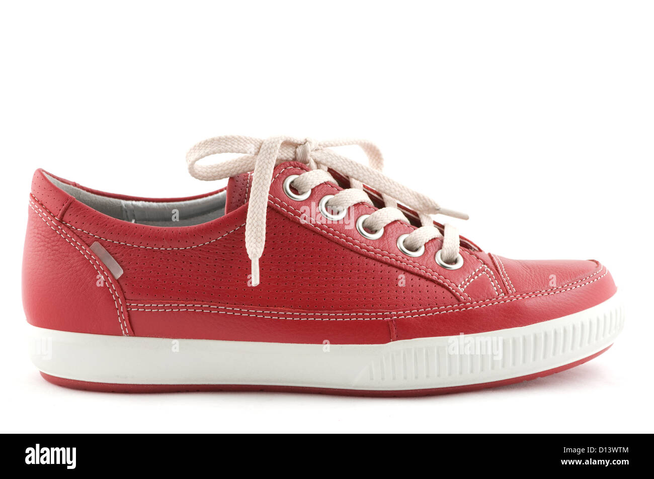 red leather sneakers on white Stock Photo - Alamy