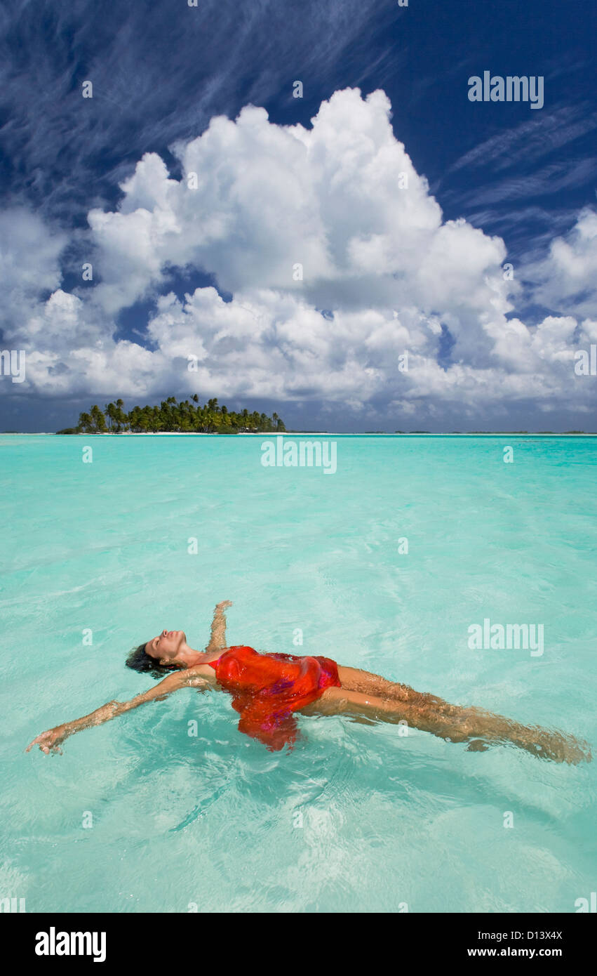 French Polynesia, Woman Floating In Ocean Water Stock Photo - Alamy