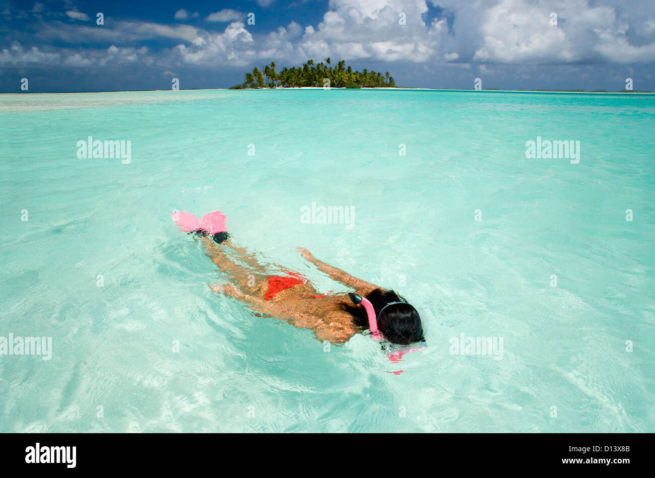 French Polynesia, Woman Snorkeling In Tropical Ocean Water Stock Photo ...