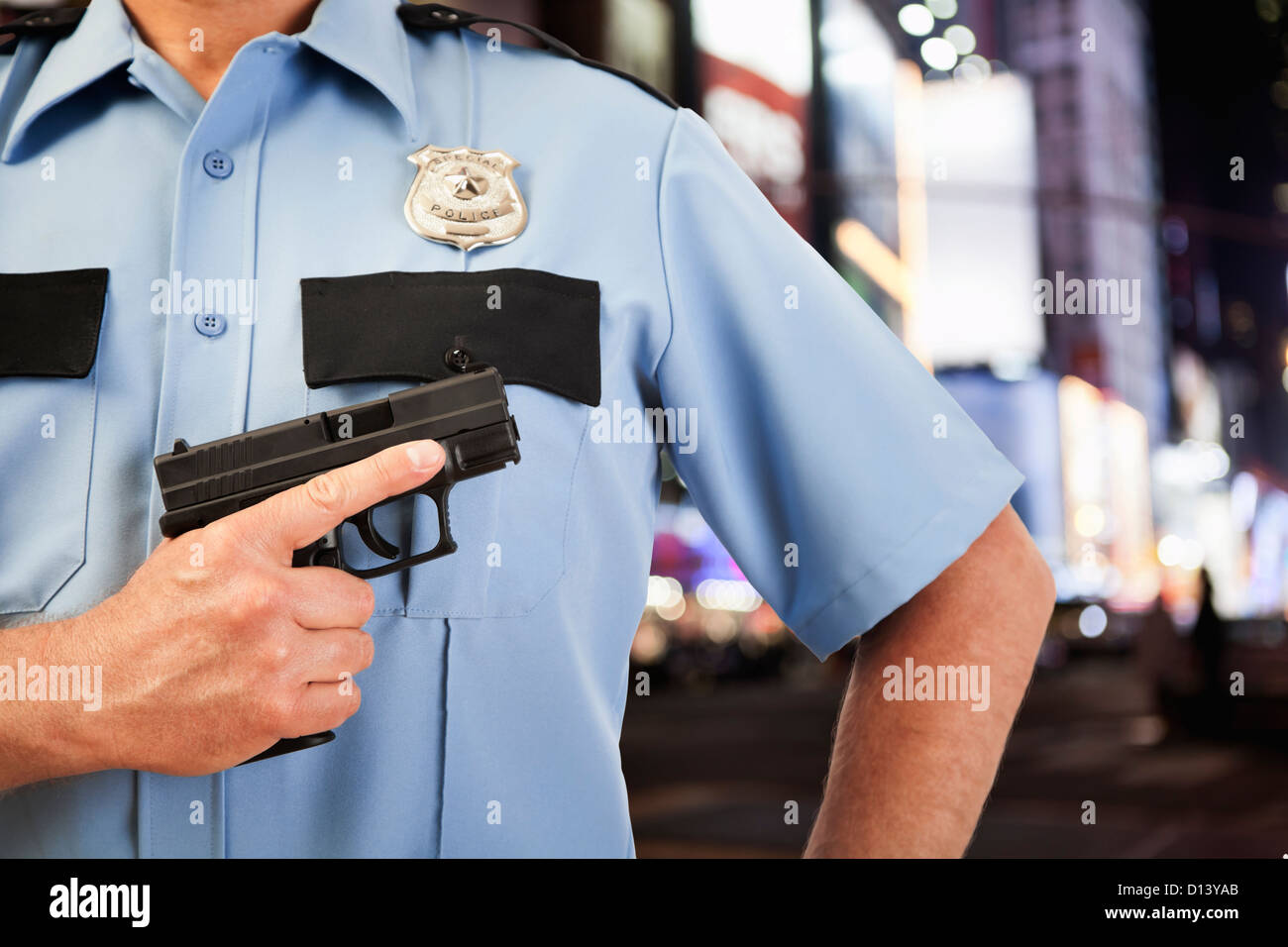 USA, Illinois, Metamora, Police officer aiming gun Stock Photo - Alamy