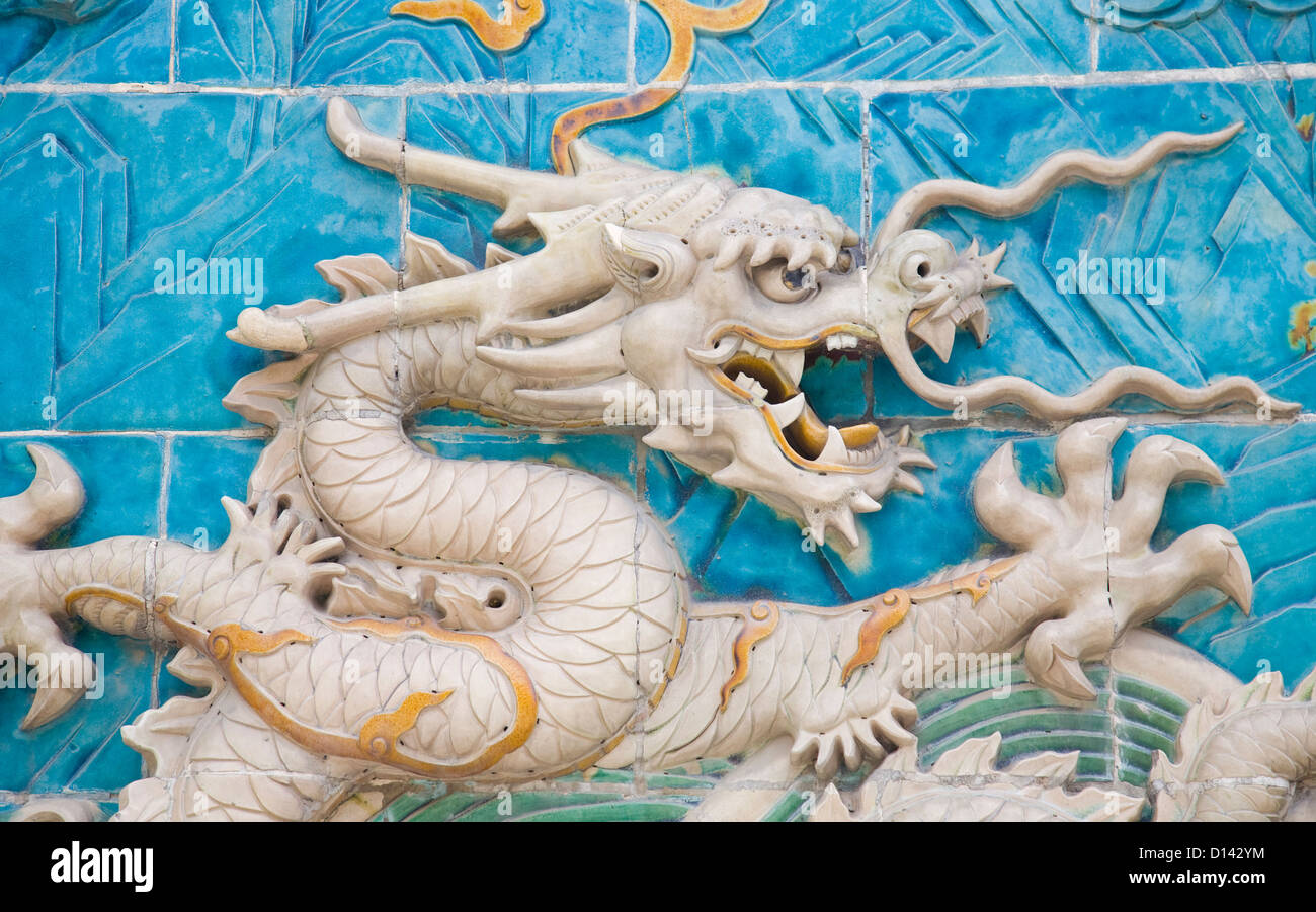 Chinese powerful dragon statue on the wall, Beihai Park, Beijing, China ...