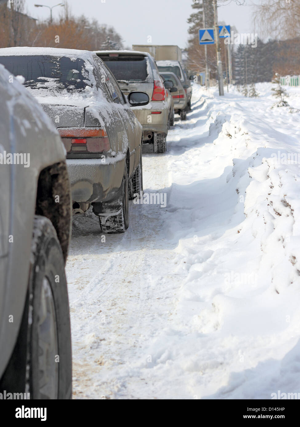 Snowy road surface from the back of unrecognizable car Stock Photo - Alamy
