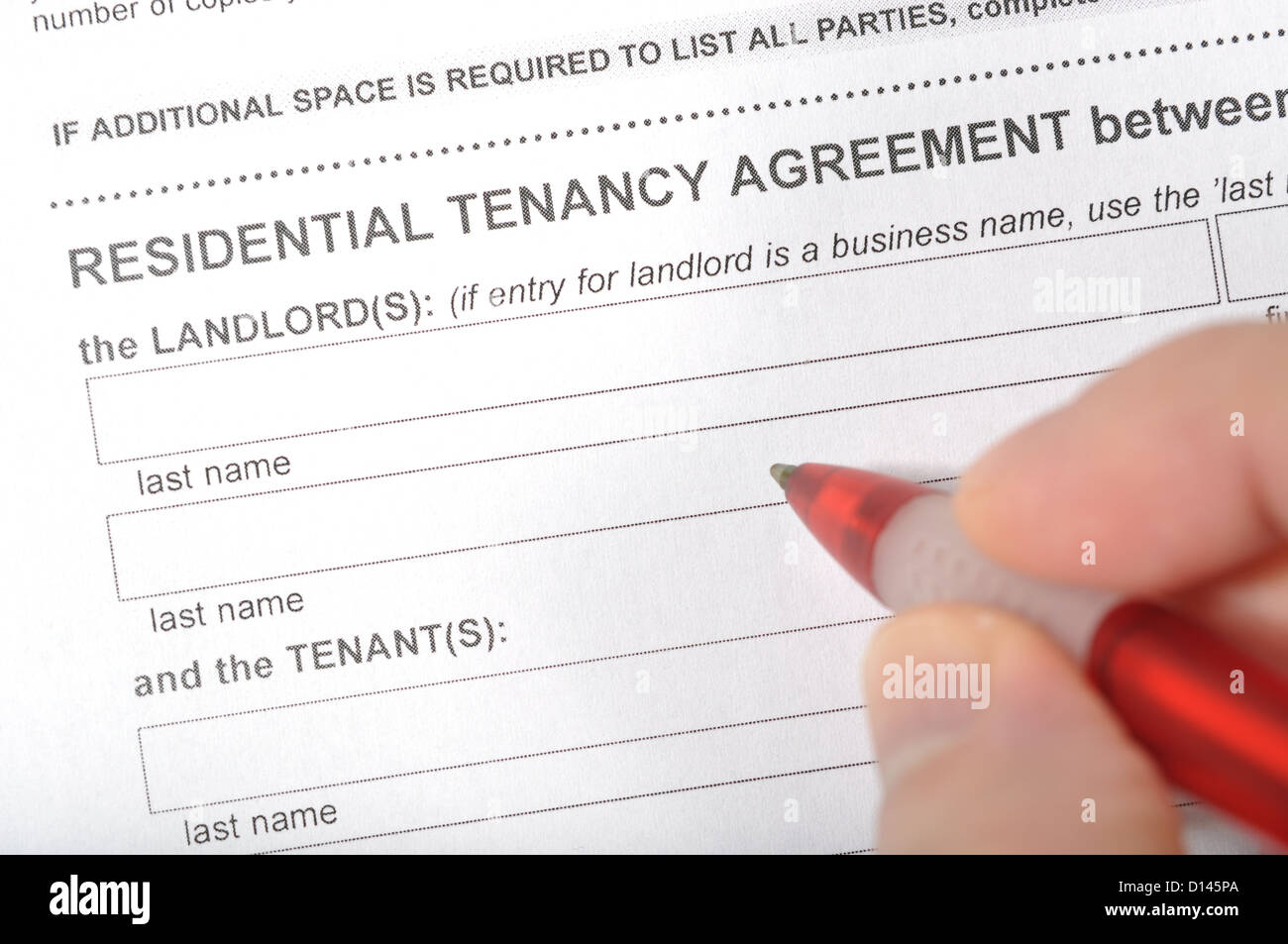 Man signing a rental contract Stock Photo - Alamy