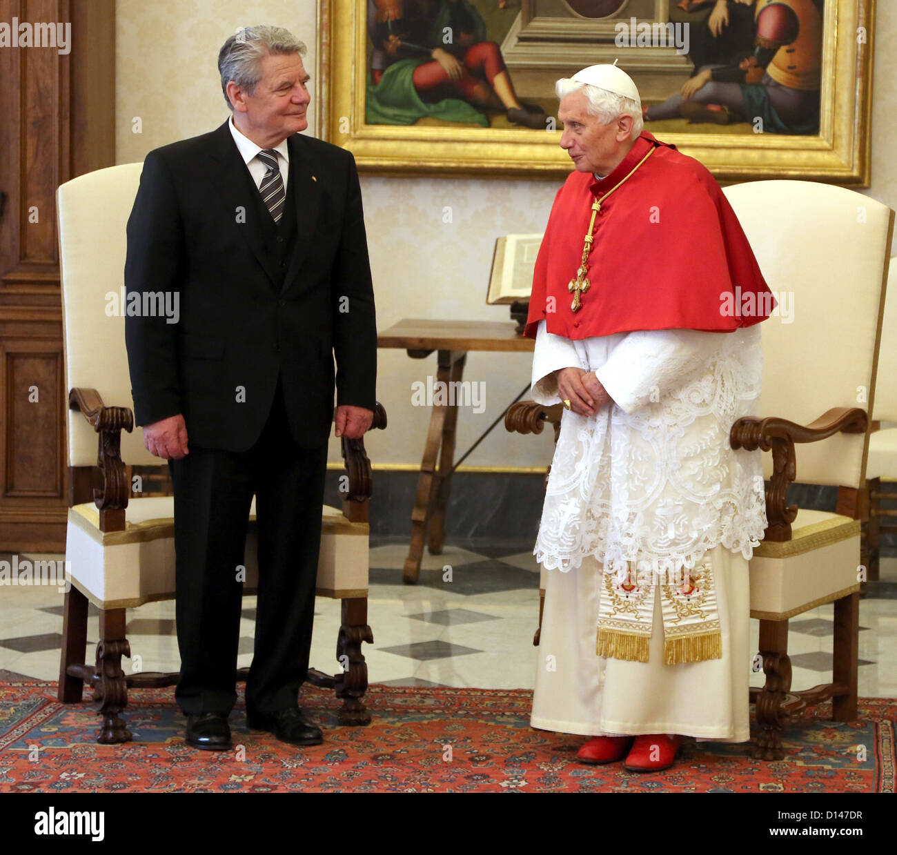 German President Joachim Gauck (L) is received by Pope Benedict XVI at ...