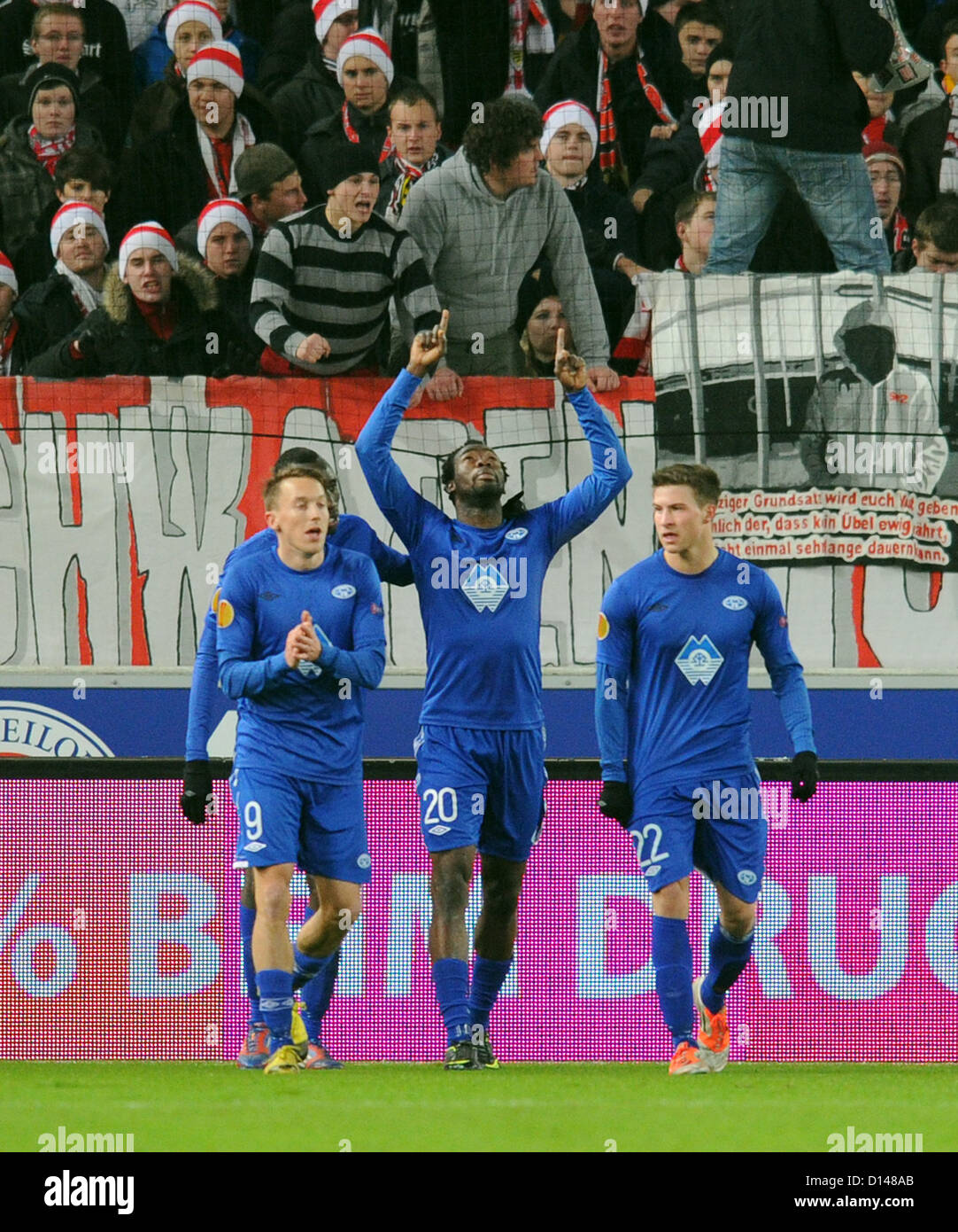Davy Claude Angan (C) celebrates with Mattias Mostrom (L) and Joshua ...