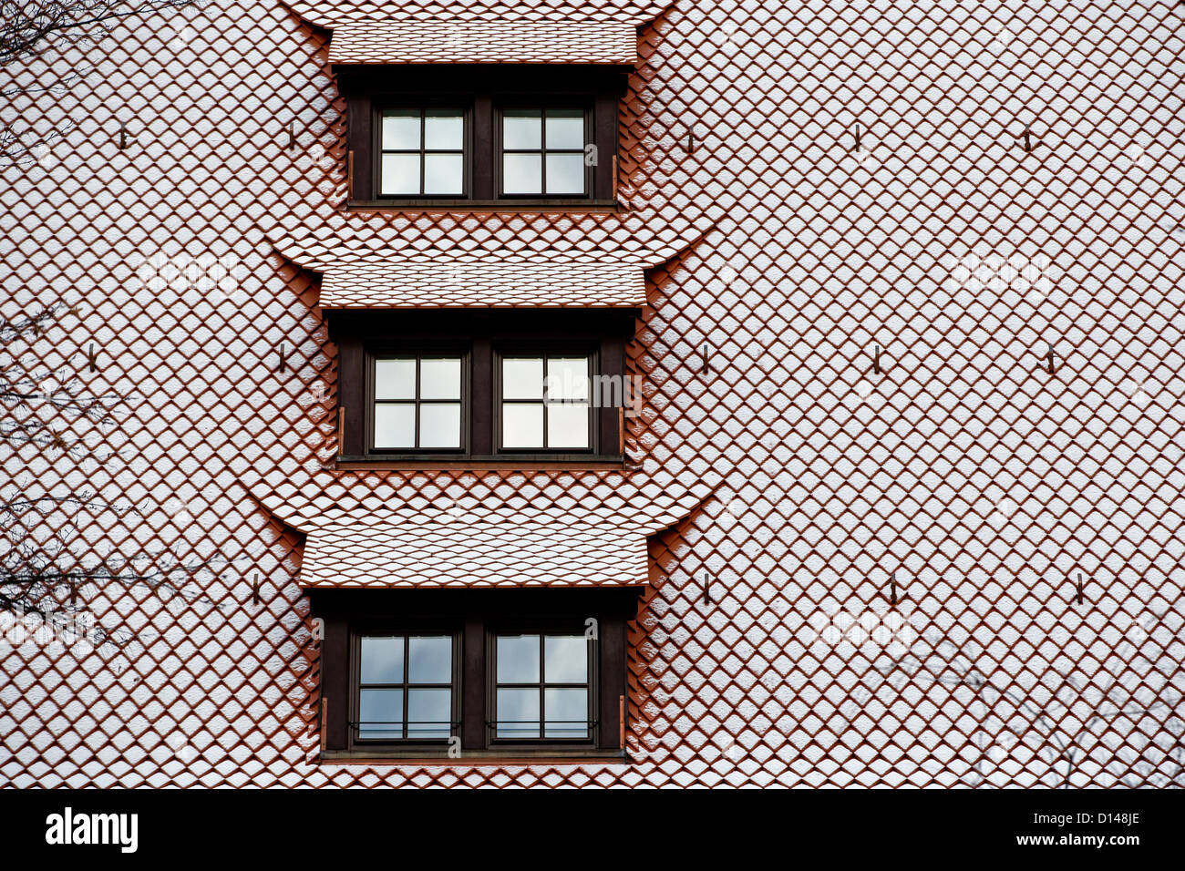 Snow sits on the rooves and dormers of the youth hostel at Nuremberg ...