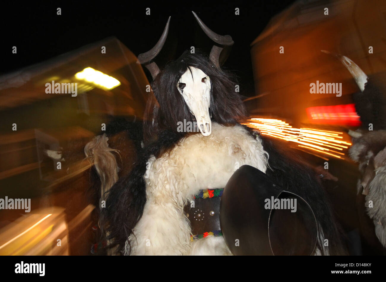 Winter fools, also known as 'Klausen', roam during a traditional parade ...