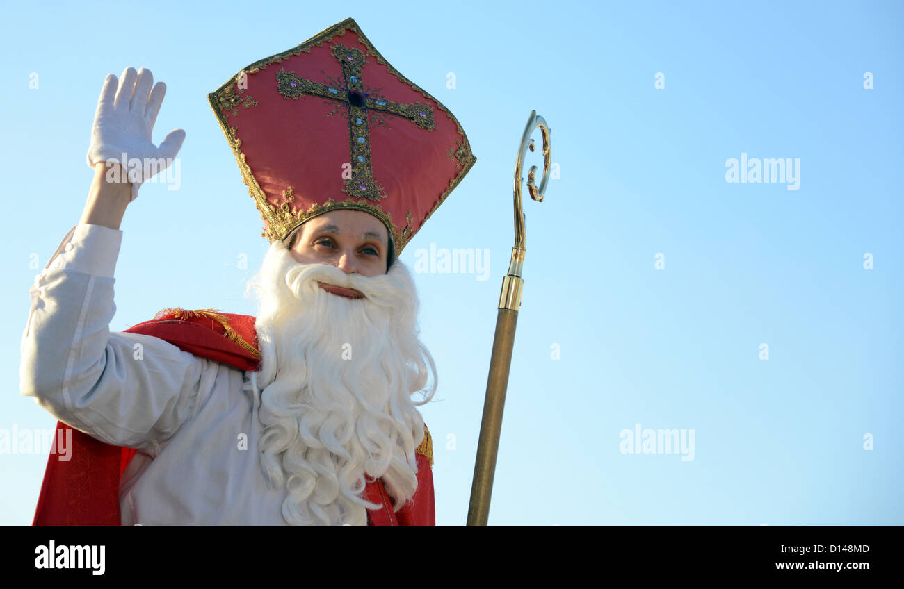 A man dressed as Saint Nicholas waves at the port in Hamburg, Germany ...