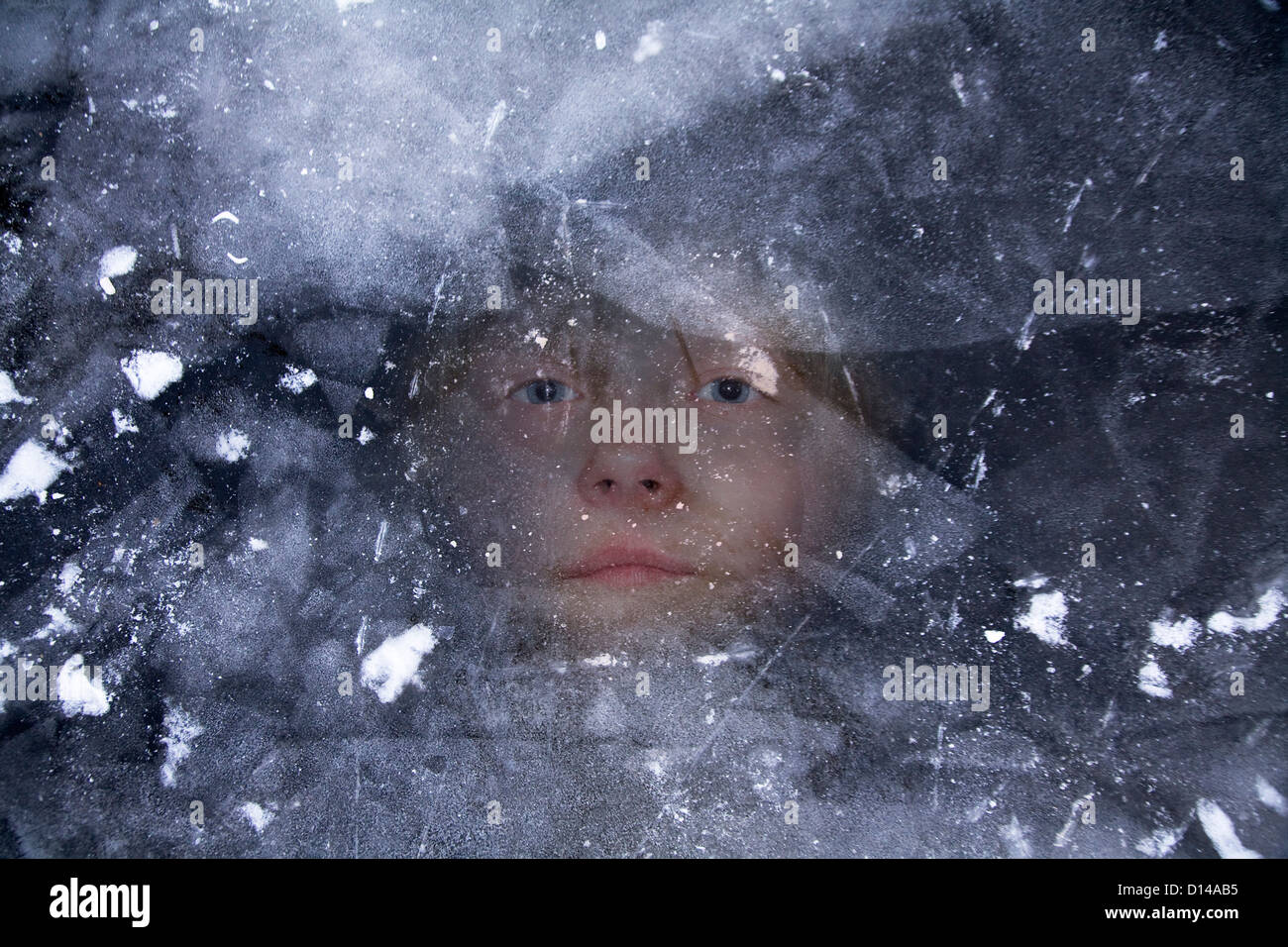 Child under the ice Stock Photo - Alamy