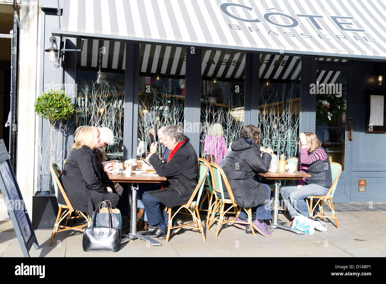 people eating outside brasserie cafe Exeter Cathedral Yard Stock Photo ...