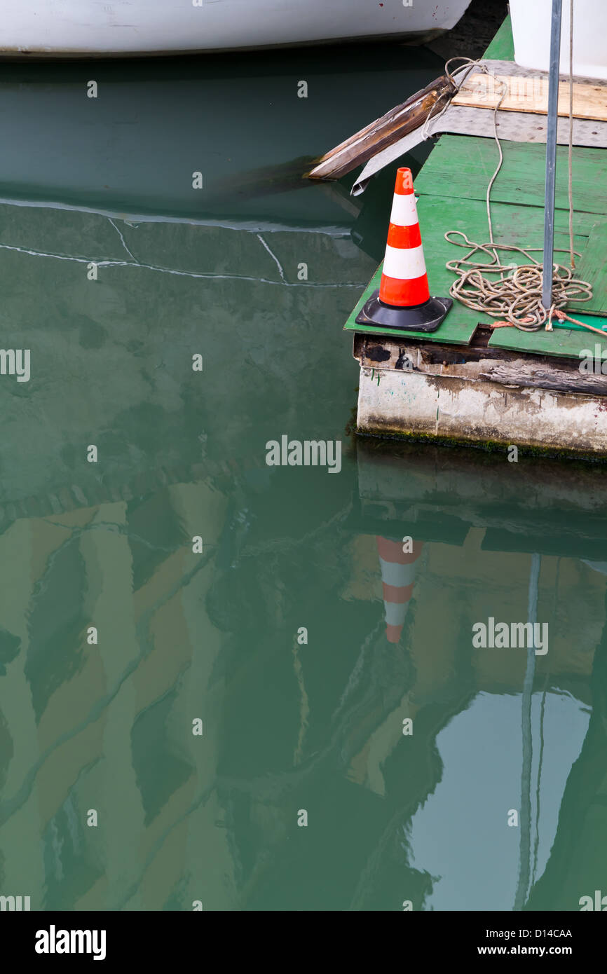 Street Cone at a Canal in Livorno in Tuscany, Italy Stock Photo - Alamy