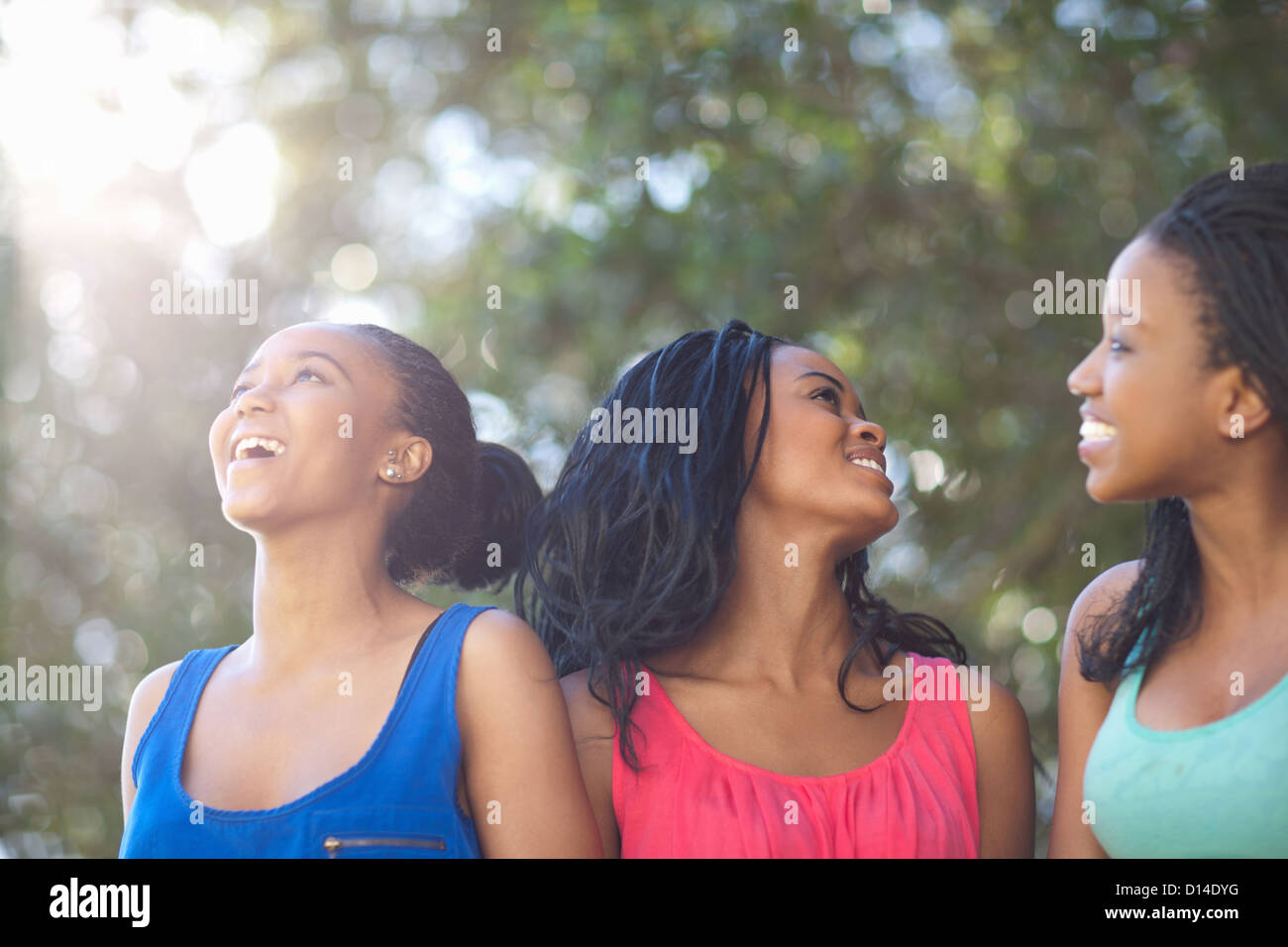 Smiling women walking outdoors Stock Photo - Alamy
