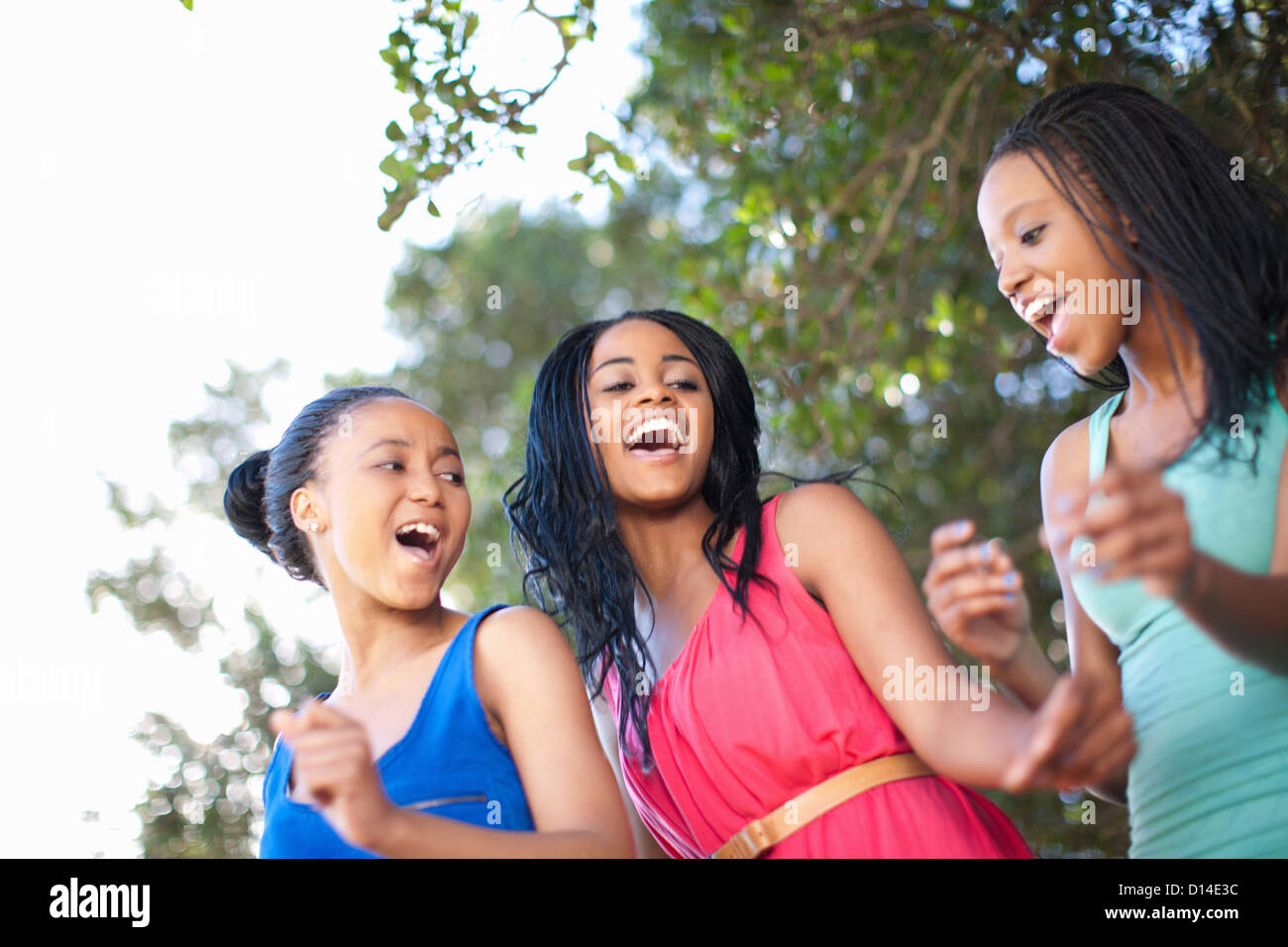 Women dancing together outdoors Stock Photo - Alamy