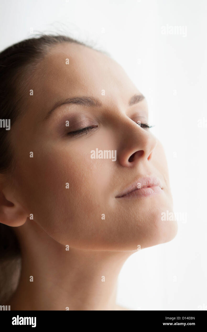 Close up of womans smiling face Stock Photo - Alamy