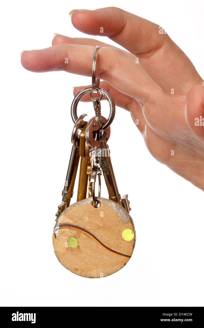 close up of a hand holding a bunch of keys Stock Photo - Alamy
