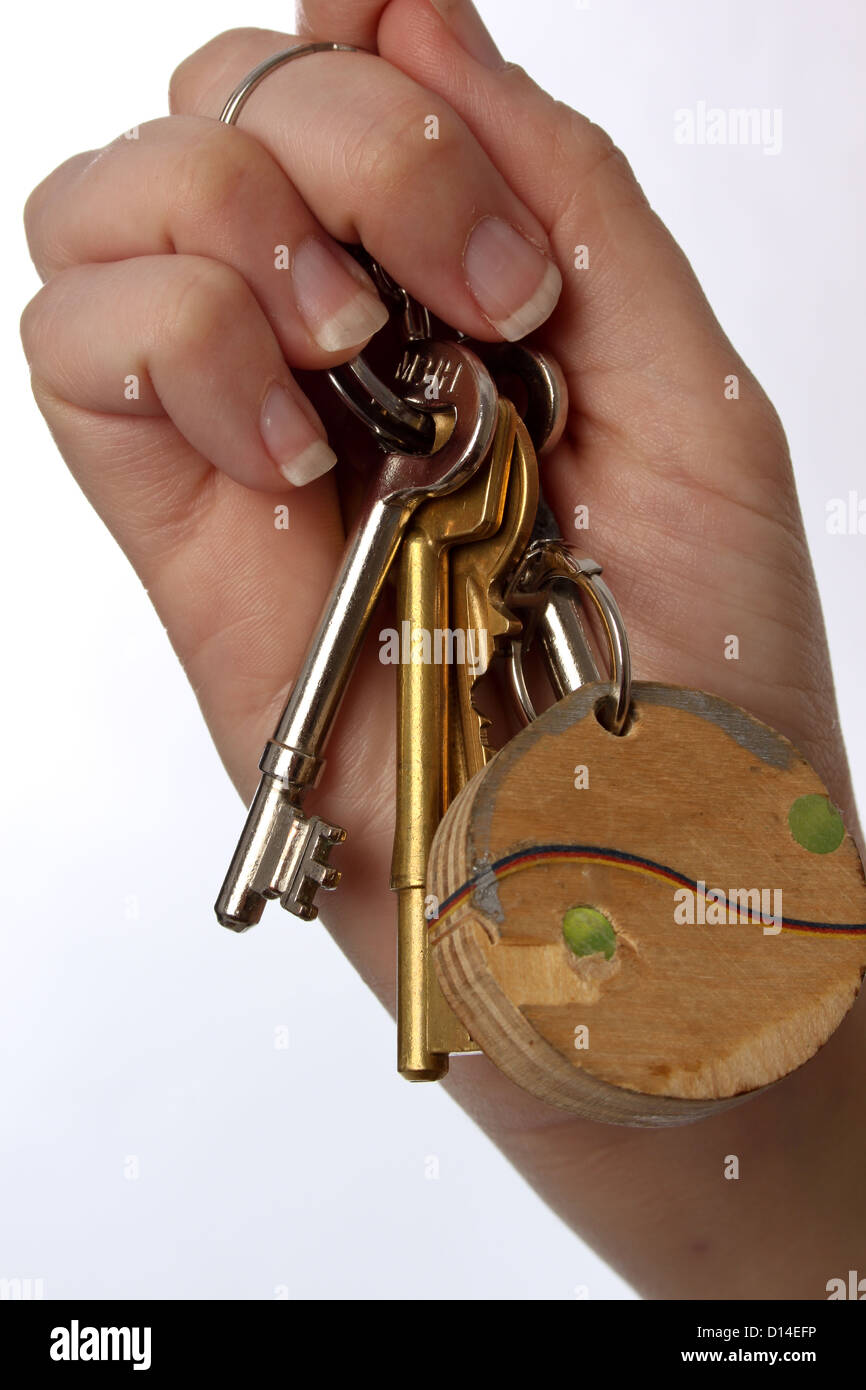 Hand dangling keys hi-res stock photography and images - Alamy