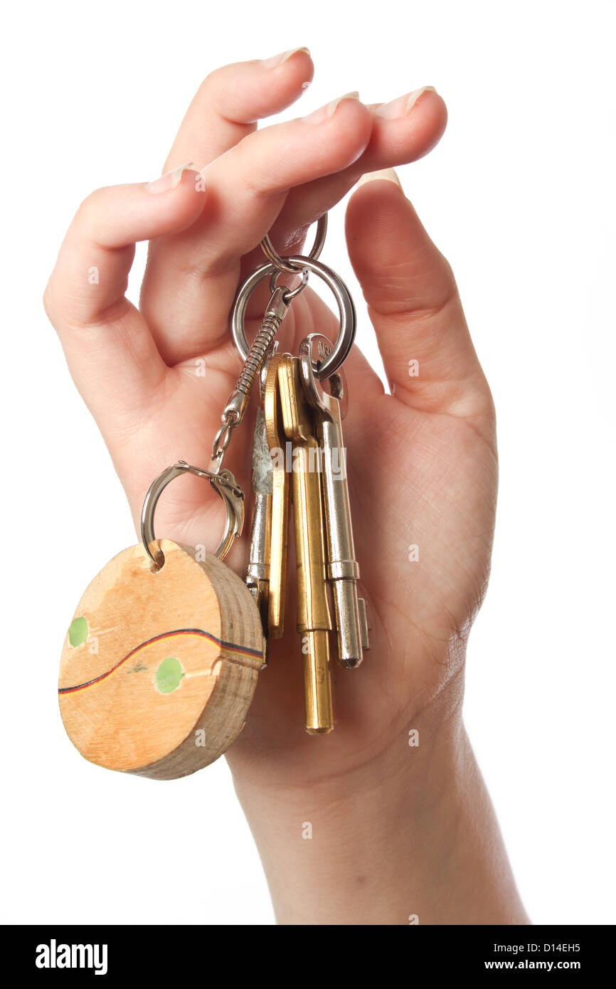 close up of a hand holding a bunch of keys Stock Photo - Alamy
