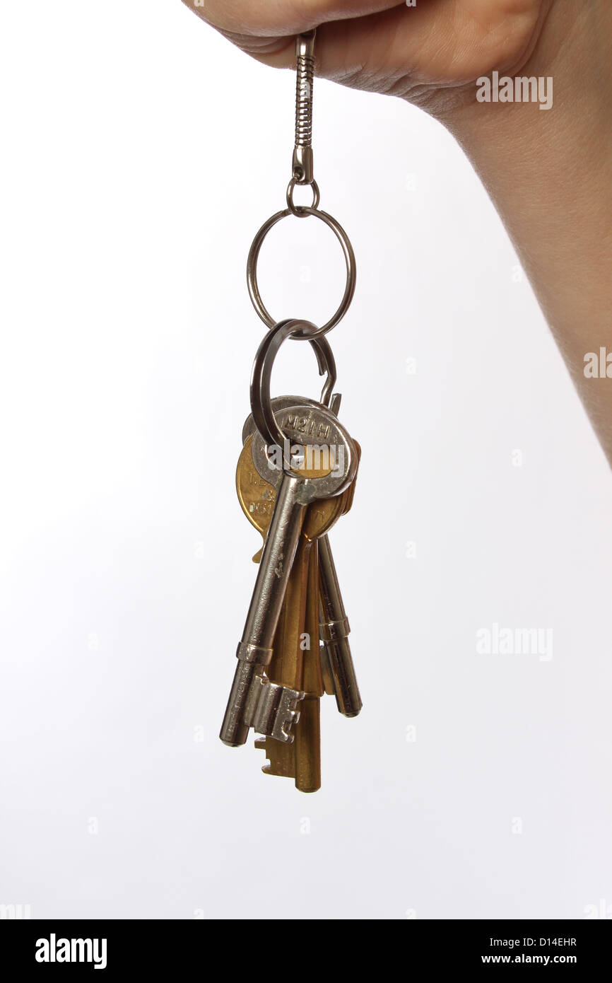 close up of a hand holding a bunch of keys Stock Photo - Alamy